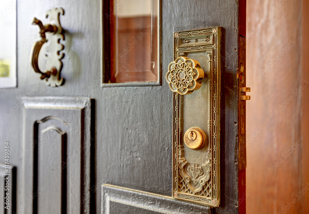 Old antique key lock door know details. Stock Photo | Adobe Stock