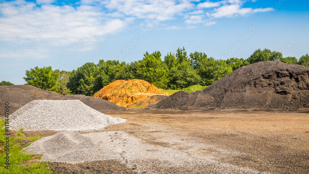 Asphalt Material Pit Assorted mounds of dirt and gravel used to make ...