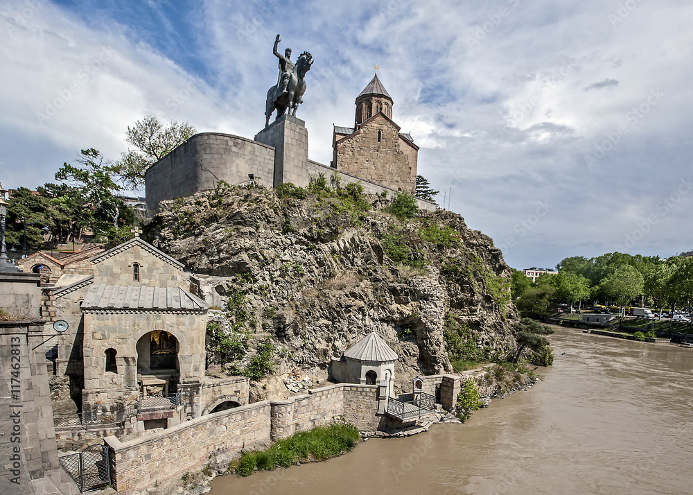 Georgia, Tbilisi. Old Metekhi district , in the rock above the river ...