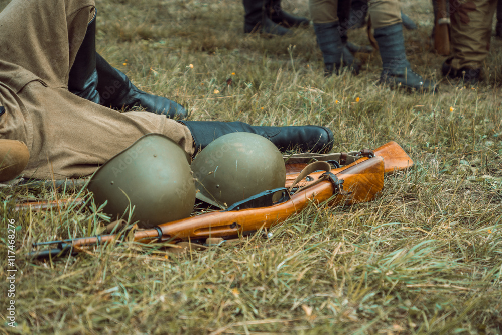 Historical reconstruction second world war. Helmet and rifle. Stock ...