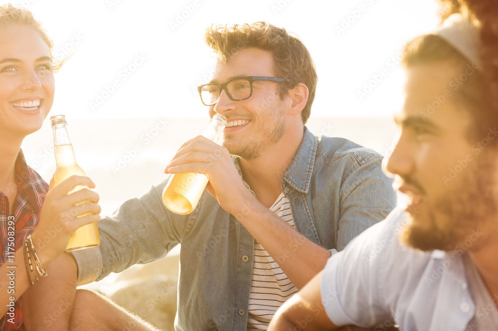 Happy friends drinking Stock Photo | Adobe Stock