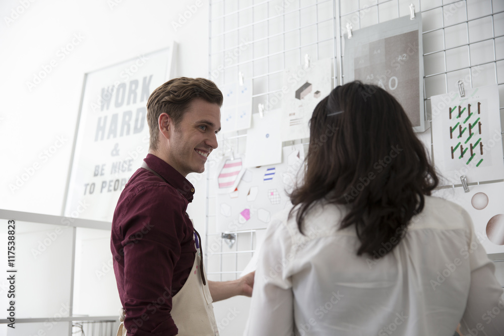 Team Working In Screen Printers Looking At Visual References Stock ...