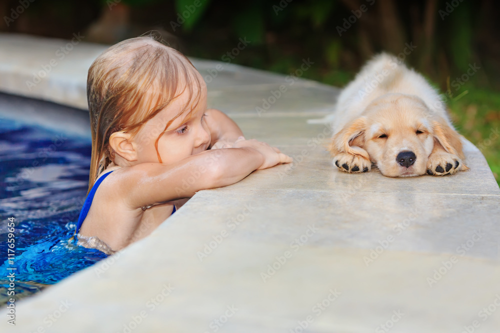Funny photo of little baby swimming in blue outdoor pool look at lazy ...