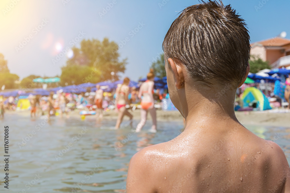 Kind badet im Meer Stock Photo | Adobe Stock