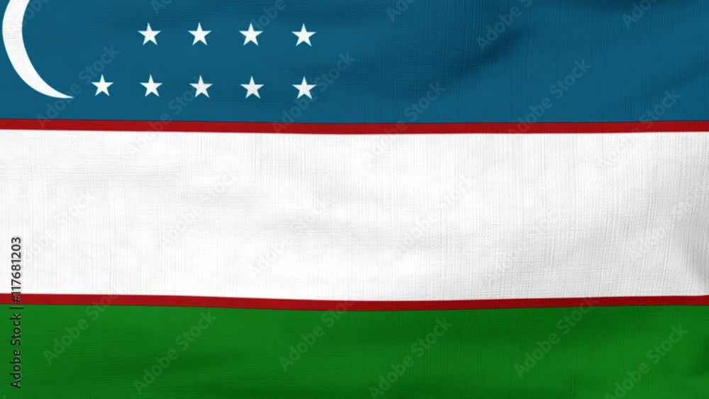 National flag of Uzbekistan flying and waving on the wind. Sate symbol ...