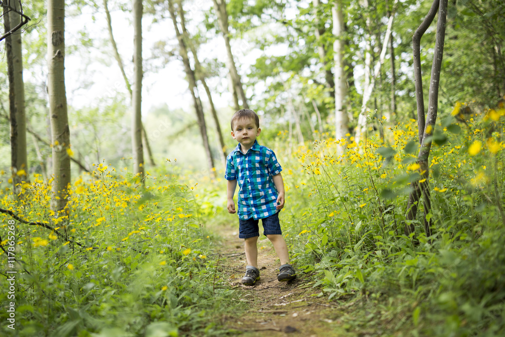 child in the forest having fun Stock Photo | Adobe Stock