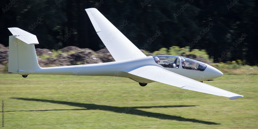 sailplane with towing rope starting on an airfield Stock Photo | Adobe ...