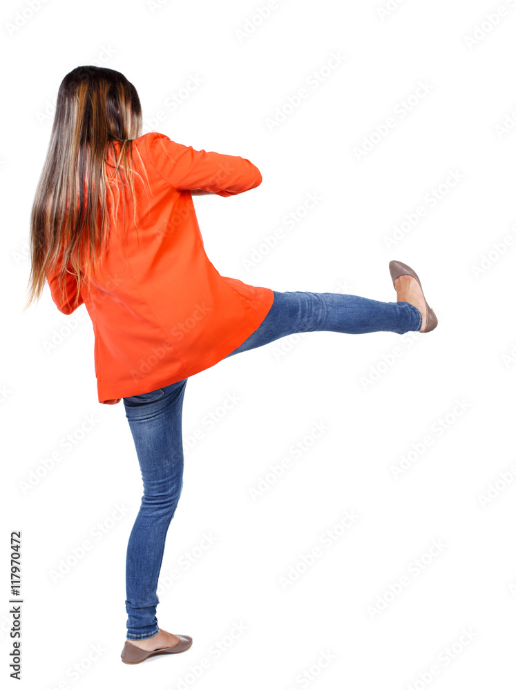 back view of woman funny fights waving his arms and legs. Rear view ...