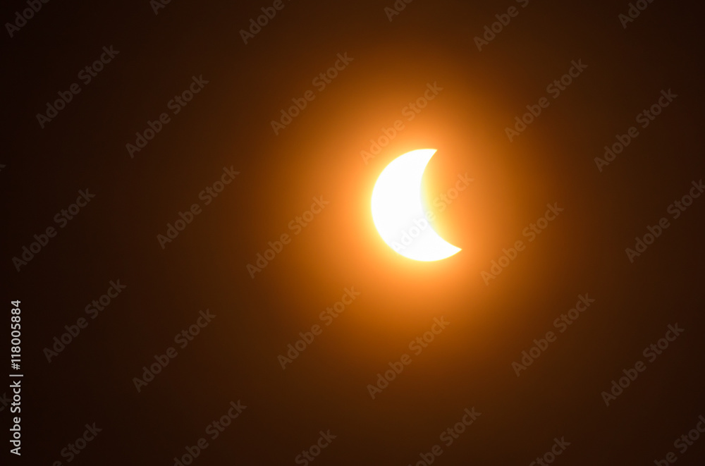Partial solar eclipse Stock Photo | Adobe Stock