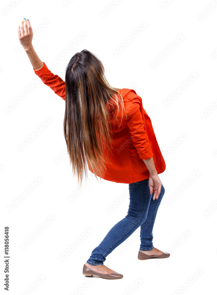 Balancing young woman. or dodge falling woman. Rear view people ...