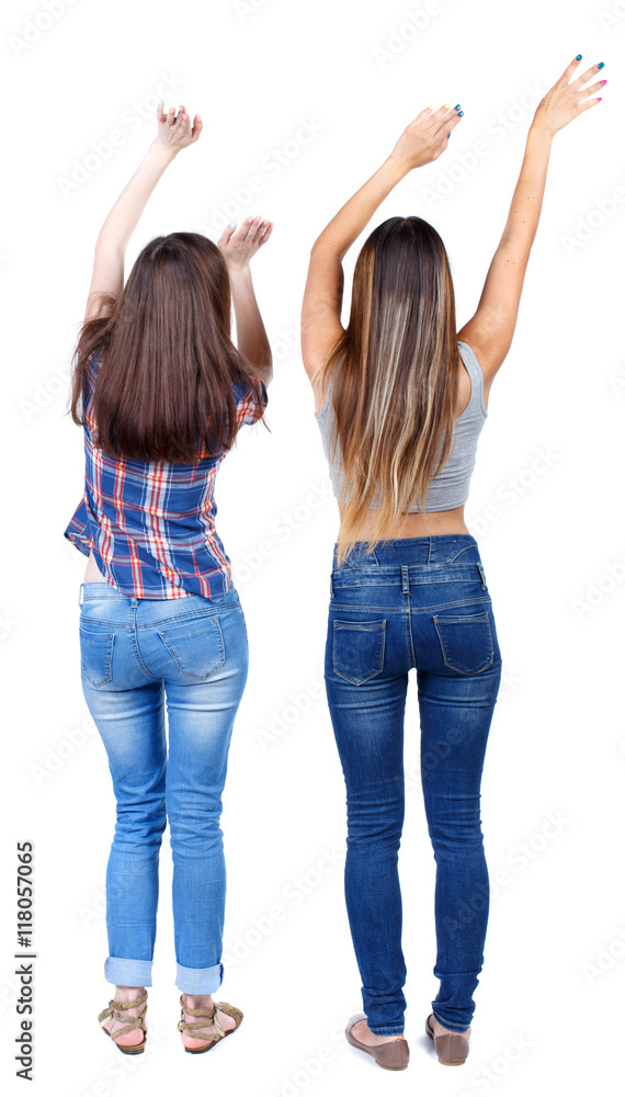 Back view of two dancing young women. Dance party. girls teens dance ...