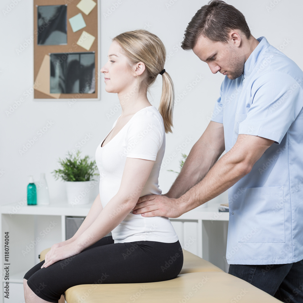 Lumbar spine mobilization Stock Photo | Adobe Stock