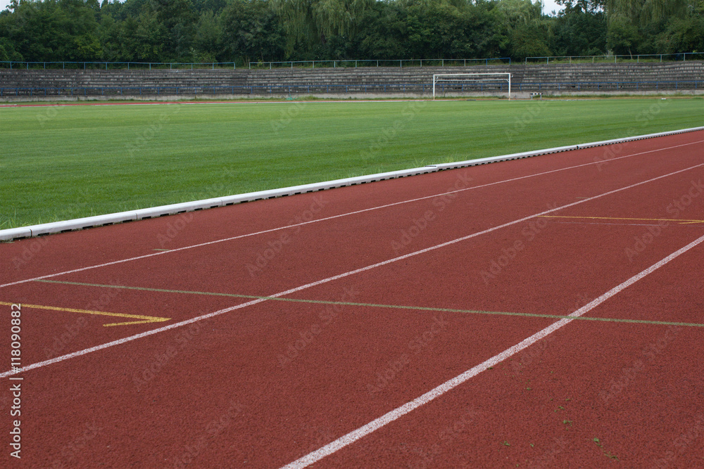 Foto Stock Running track and football pitch on a old athletic stadium ...