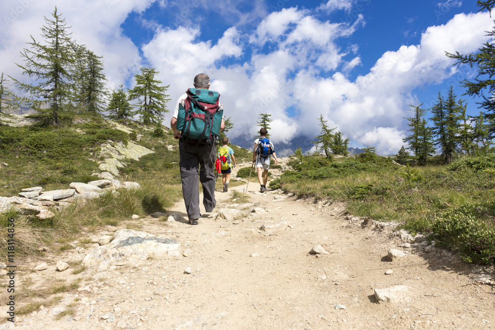 people walking on a mountain trail Stock Photo | Adobe Stock