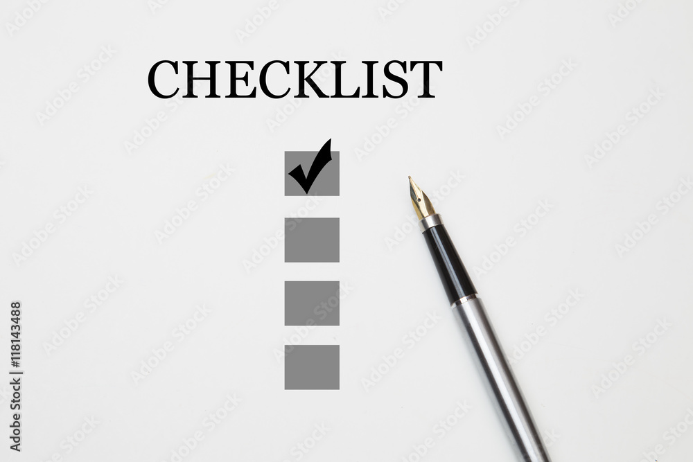 checklist with a ticked box and a pen Stock Photo | Adobe Stock