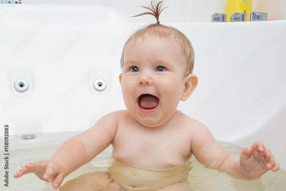 Little newborn baby girl bathe, swim and wash Stock Photo | Adobe Stock