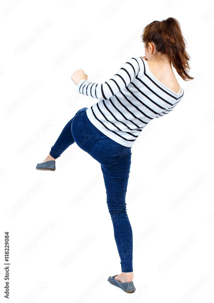 back view of woman funny fights waving his arms and legs. Rear view ...