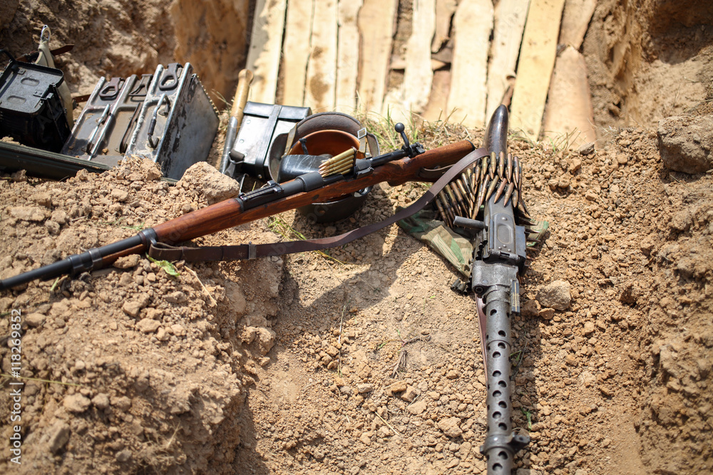 machine gun, rifle and ammunition in the trenches Stock Photo | Adobe Stock