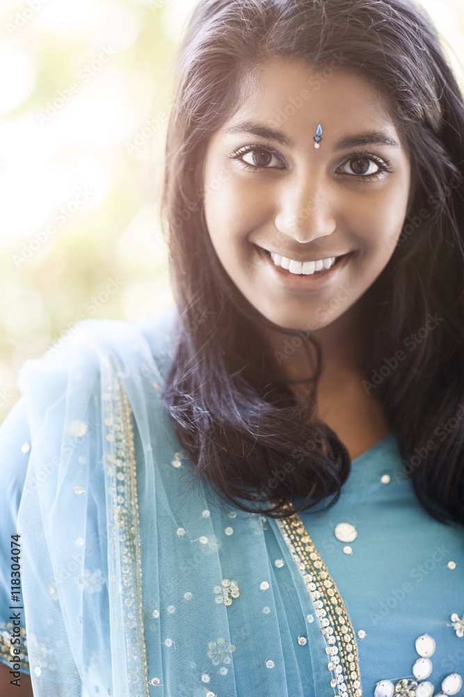 Indian woman in traditional clothing Stock Photo | Adobe Stock
