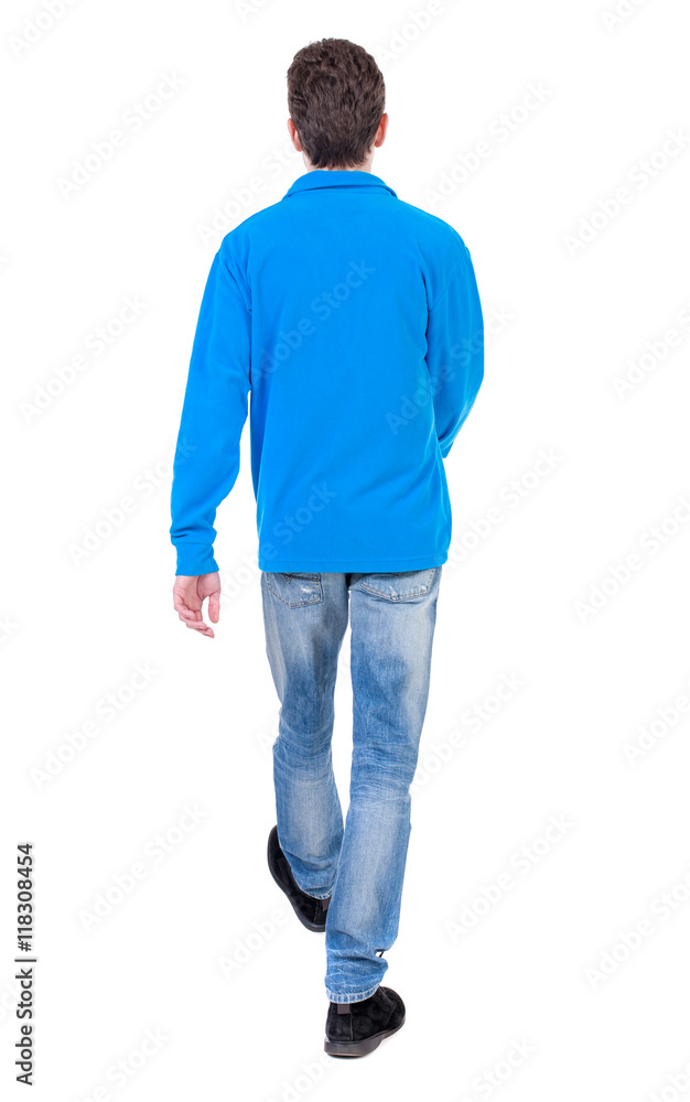 Back view of going handsome man. walking young guy . Rear view people ...