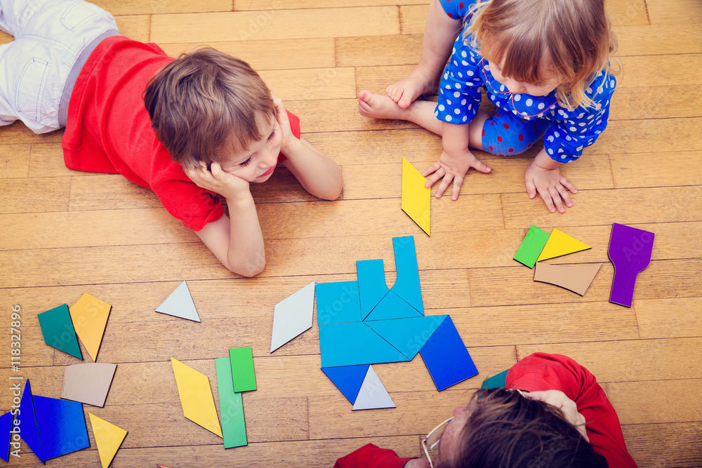 teacher and kids playing with geometric shapes, early learning Stock ...