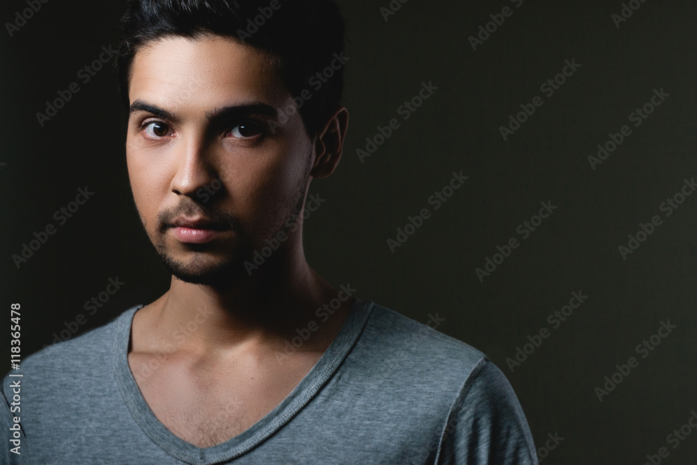 Portrait of a normal boy over grey background / Attractive young Stock ...