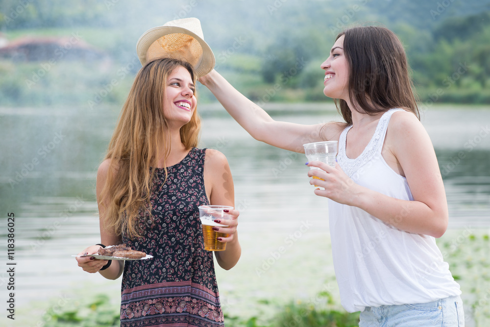 Two girs enjoy in food in nature Stock Photo | Adobe Stock