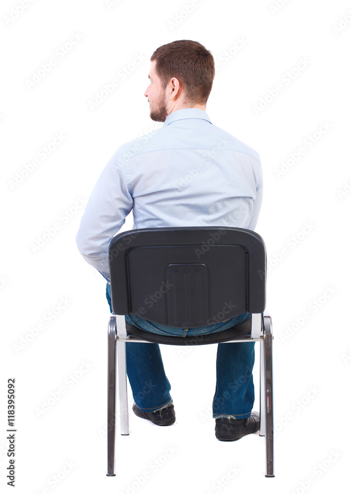 back view of business man sitting on chair. businessman watching. Rear ...