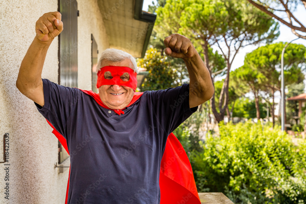 old man dressed as a superhero Stock Photo | Adobe Stock