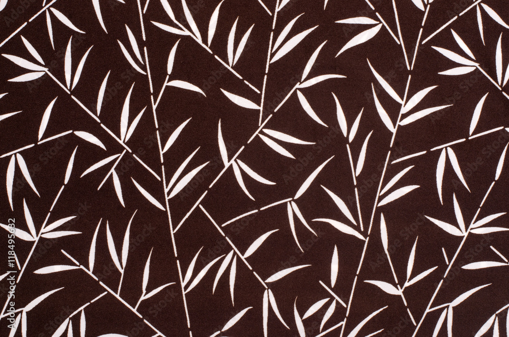 Bamboo leaves pattern on brown fabric. Tropical leaves print as ...