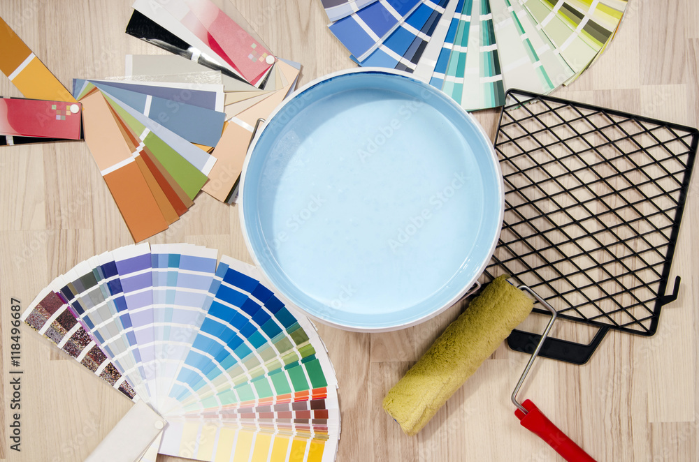 Blue paint can. Samples with different shades of blue and can of blue ...