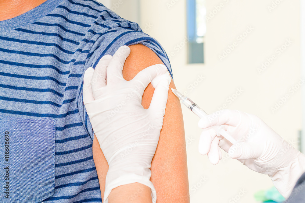 injection vaccine to patient Stock Photo | Adobe Stock