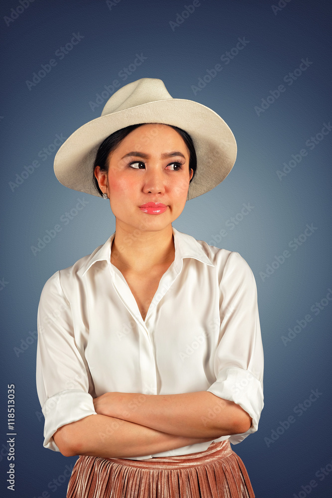 Zdjęcie Stock: Young asian woman with her impatient and bored face ...