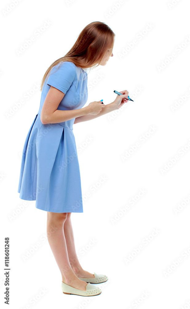 back view of writing beautiful woman. Rear view people collection ...