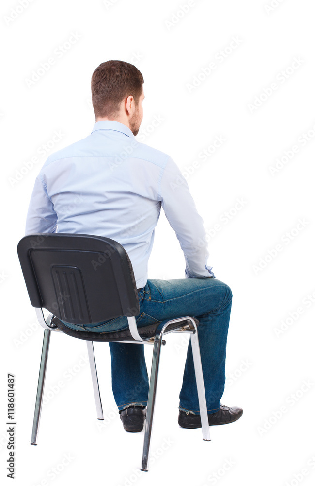 back view of business man sitting on chair. businessman watching. Rear ...