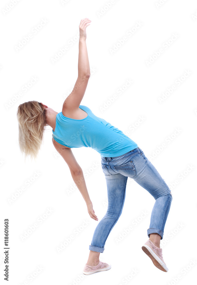 Balancing young woman. or dodge falling woman. Rear view people ...