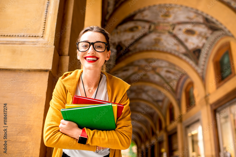 Portrait of a young female student dressed casually in the famous ...