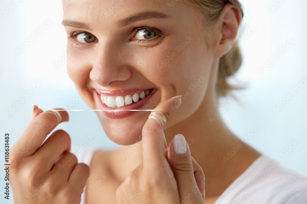 Dental Care. Woman With Beautiful Smile Using Floss For Teeth. High ...