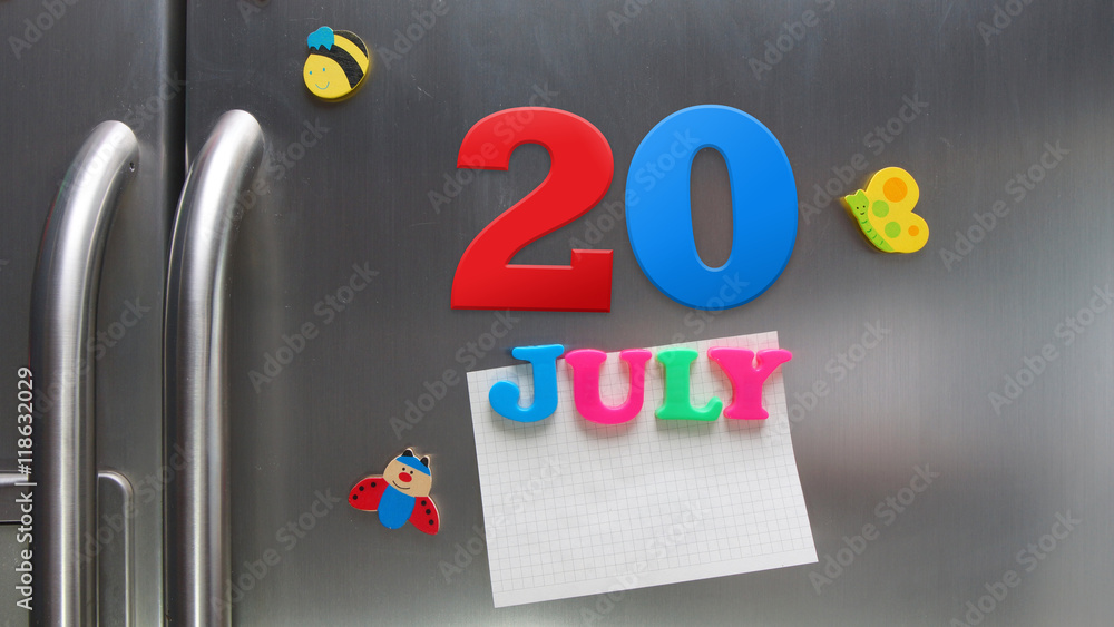 July 20 calendar date made with plastic magnetic letters holding a note ...