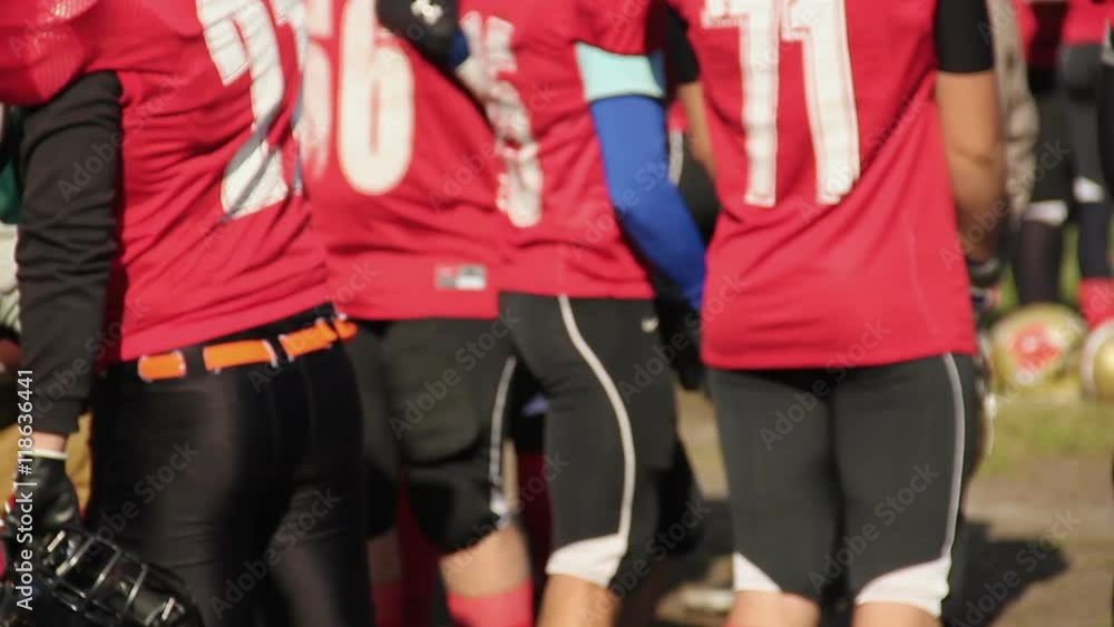 Successful football players receiving congratulations from supporters ...