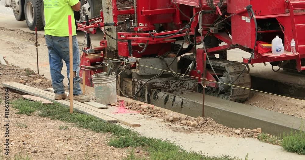 Concrete construction curb gutter street. Building road rural town ...
