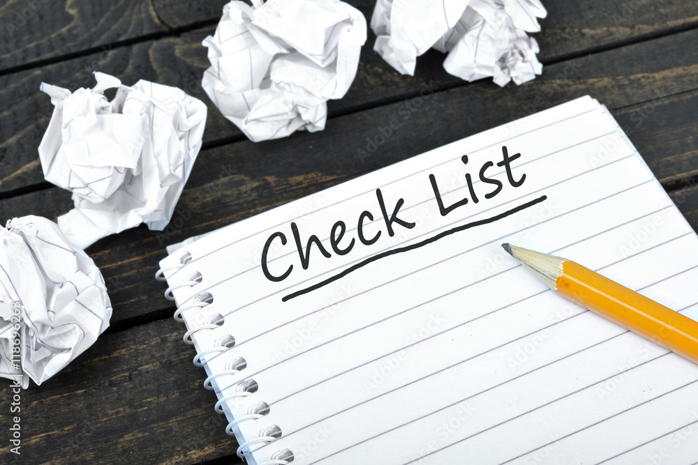Check list on notepad Stock Photo | Adobe Stock