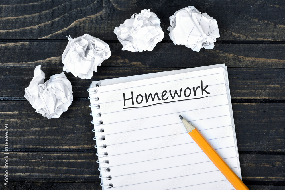 Homework text on notepad Stock Photo | Adobe Stock