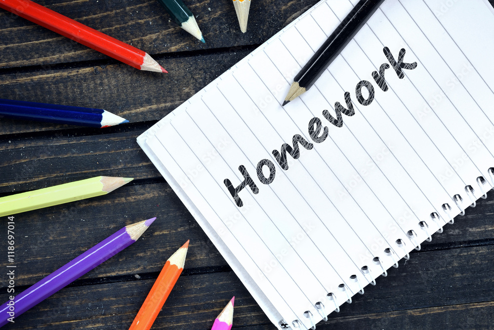 Homework text on notepad Stock Photo | Adobe Stock