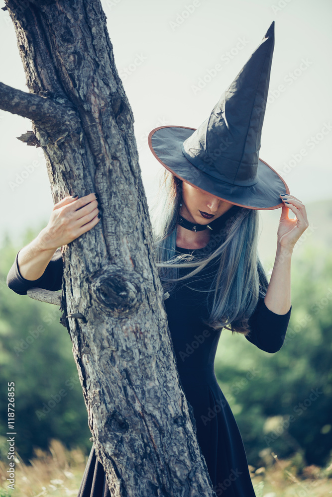 Halloween witch walking outdoor Stock Photo | Adobe Stock