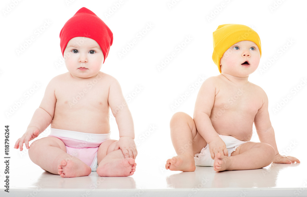 Two lovely kids in hats, isolated Stock Photo | Adobe Stock