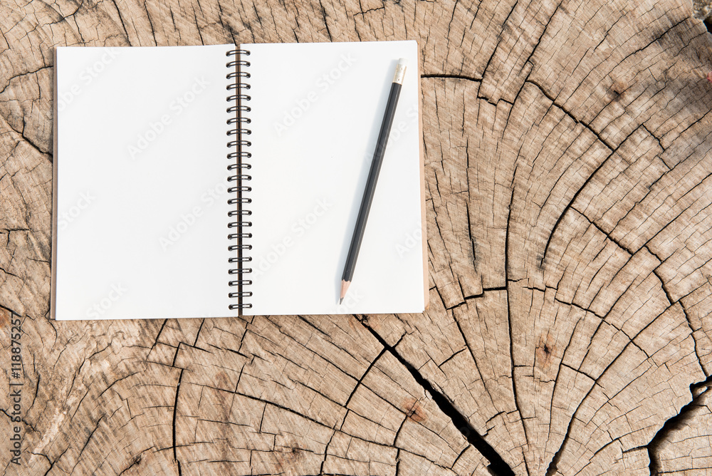 Blank notebook, black pencil with wood texture background, Working ...