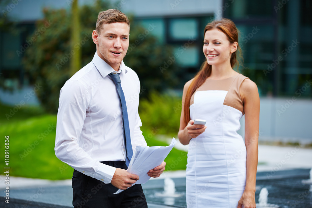 Two business trainees talking Stock Photo | Adobe Stock