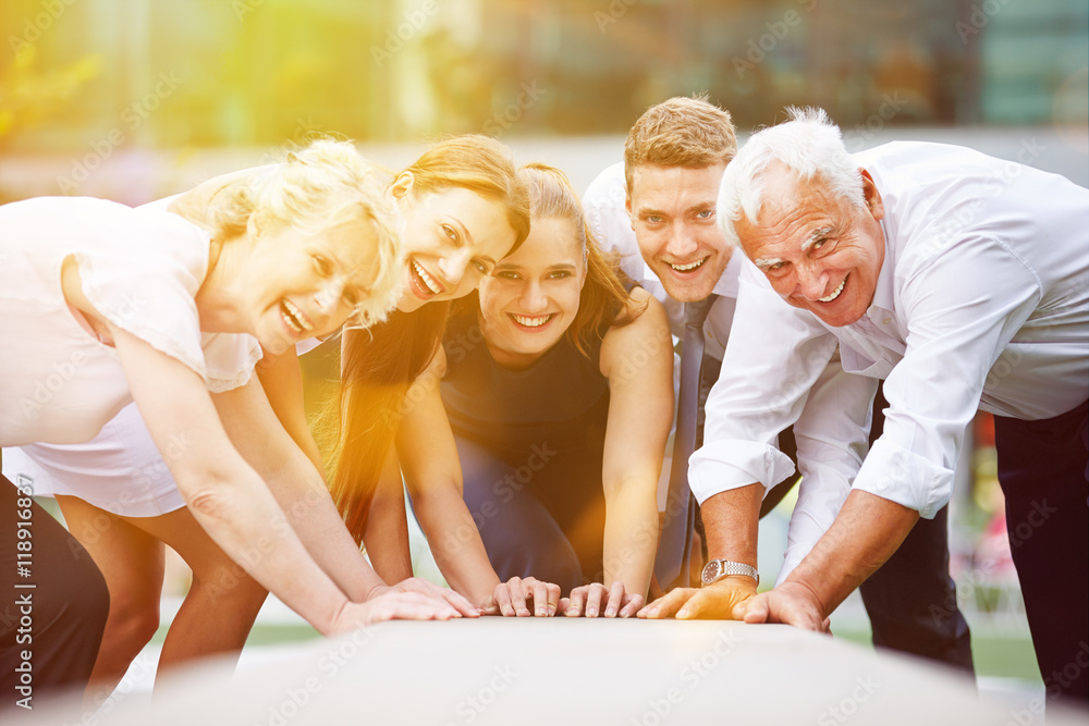 Successful business team showing strength and power Stock Photo | Adobe ...