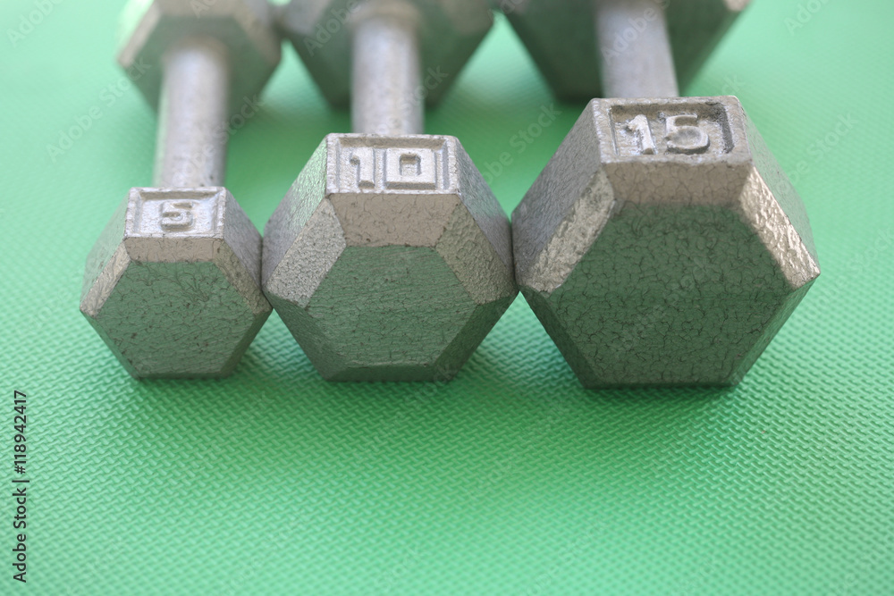 Stockfoto 5, 10 and 15 pound weights in a row Horizontal orientation ...